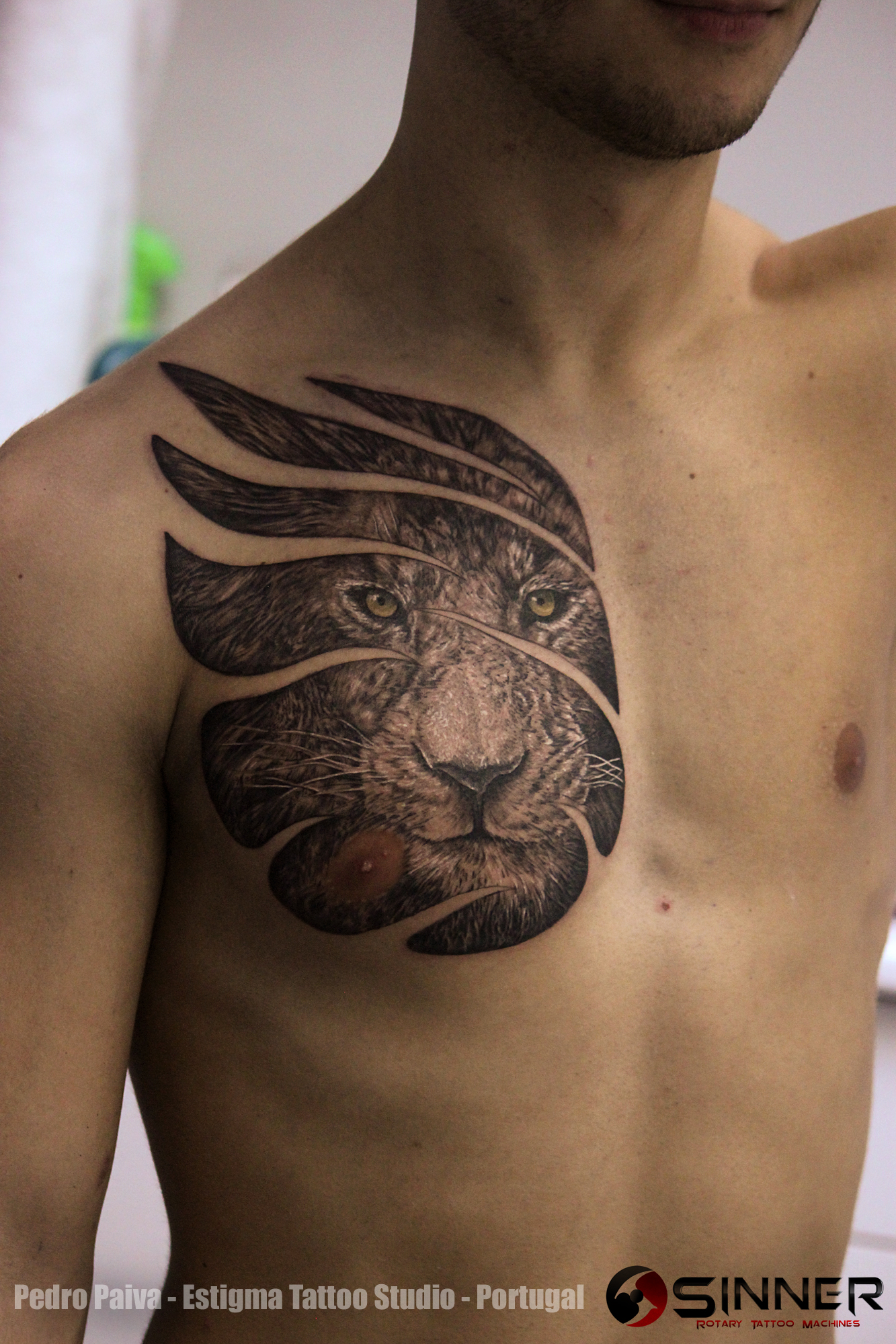 Lion Tribal Chest Tattoo