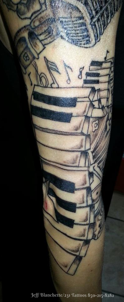 Broken Piano Keys Tattoo