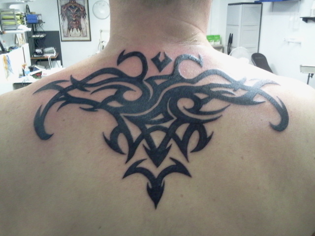 Tribal Tattoos On Upper Back
